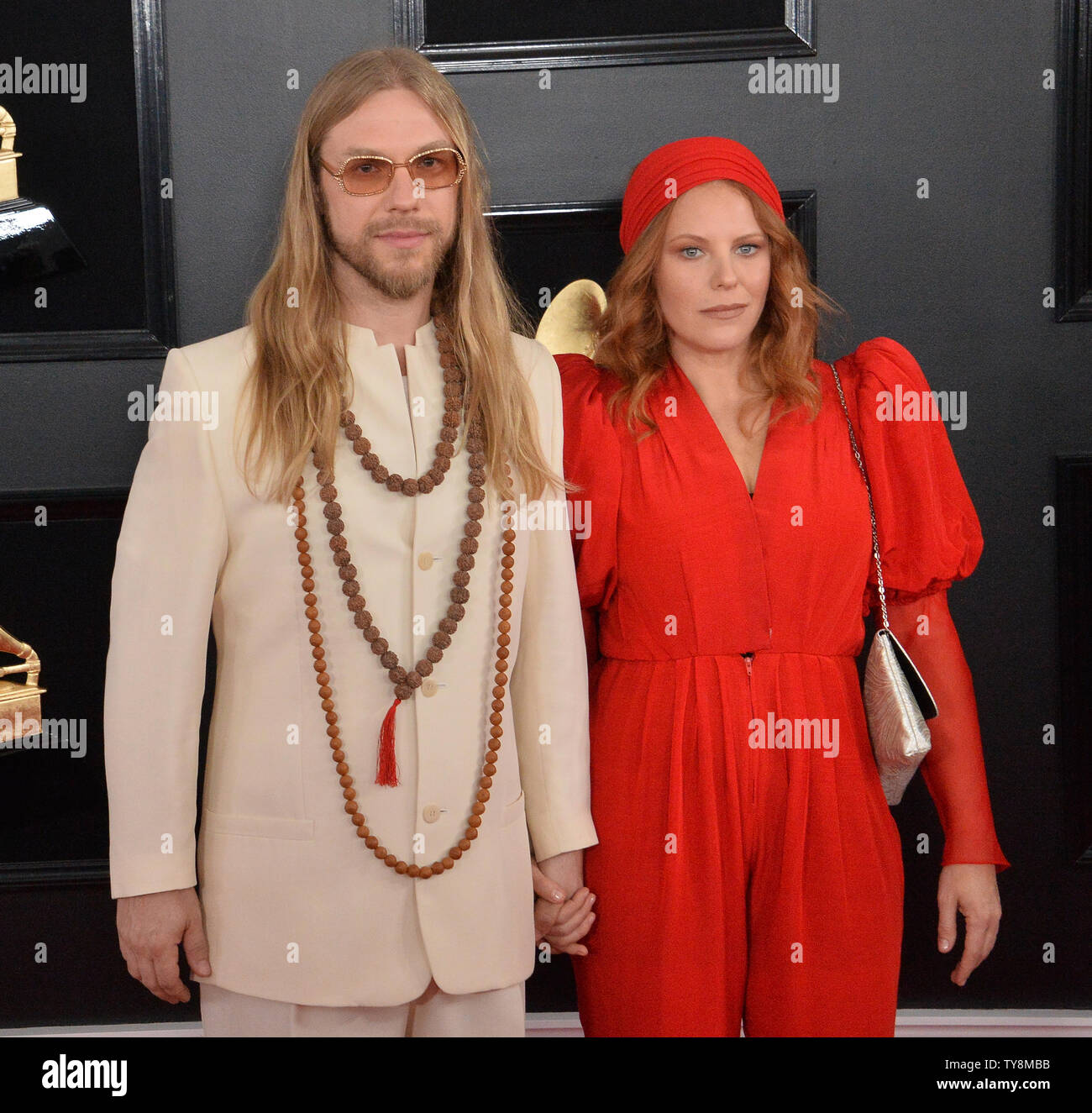 Ian Fitchuk (L) and Megan Thompson arrive for the 61st annual Grammy ...