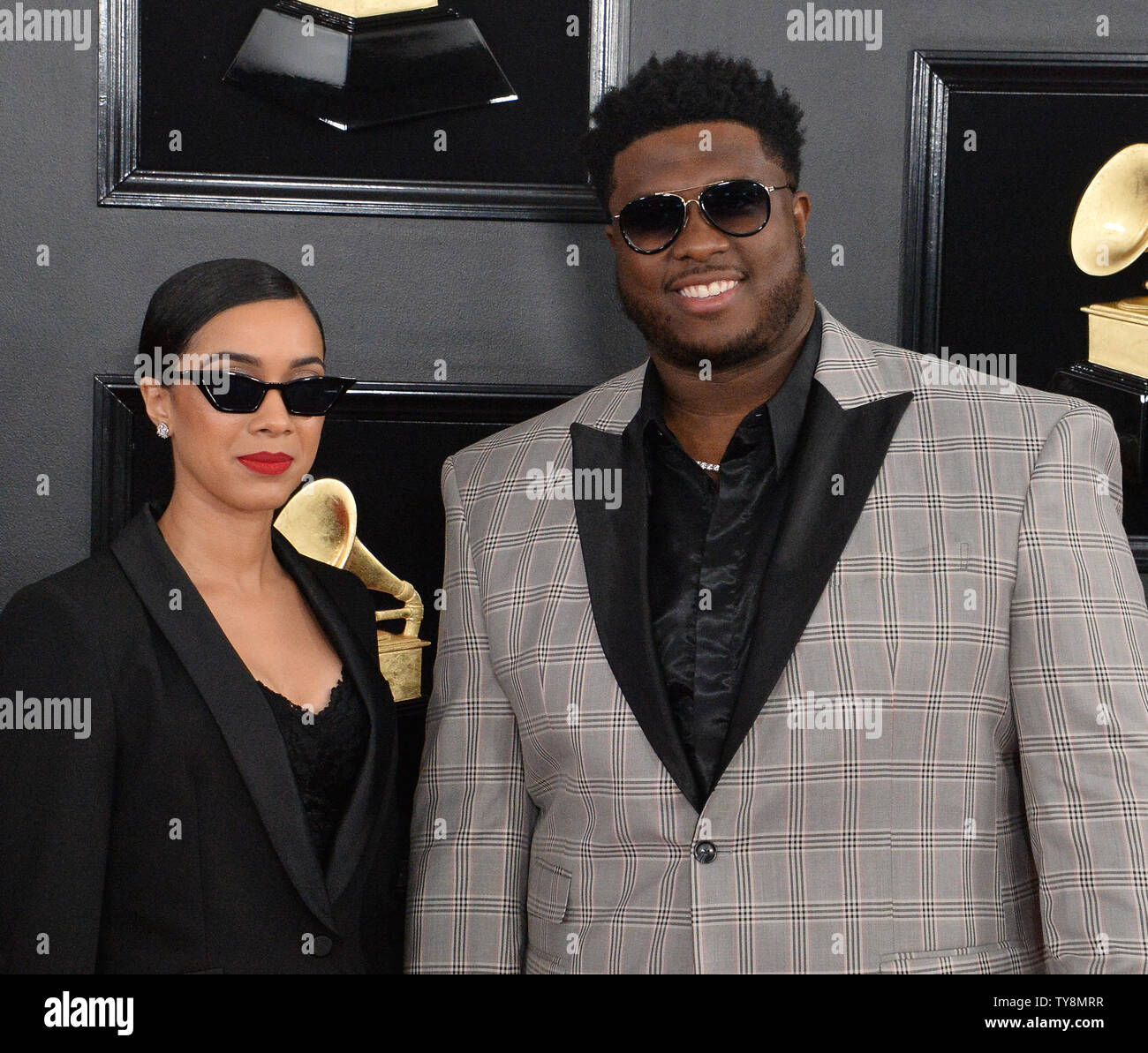 Swagg R'Celious and guest arrive for the 61st annual Grammy Awards held ...