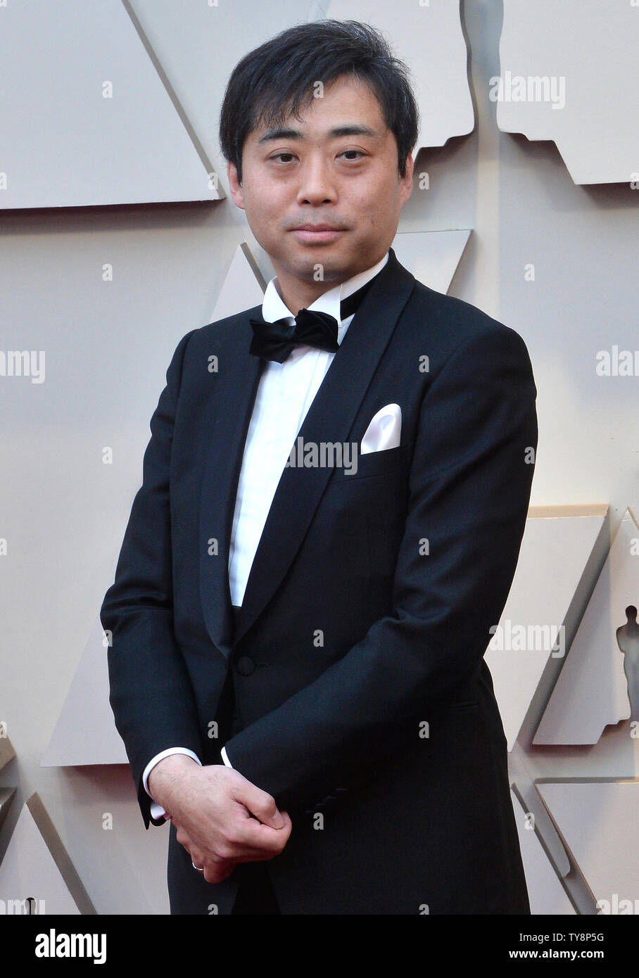 Yuichiro Saito arrives on the red carpet for the 91st annual Academy ...