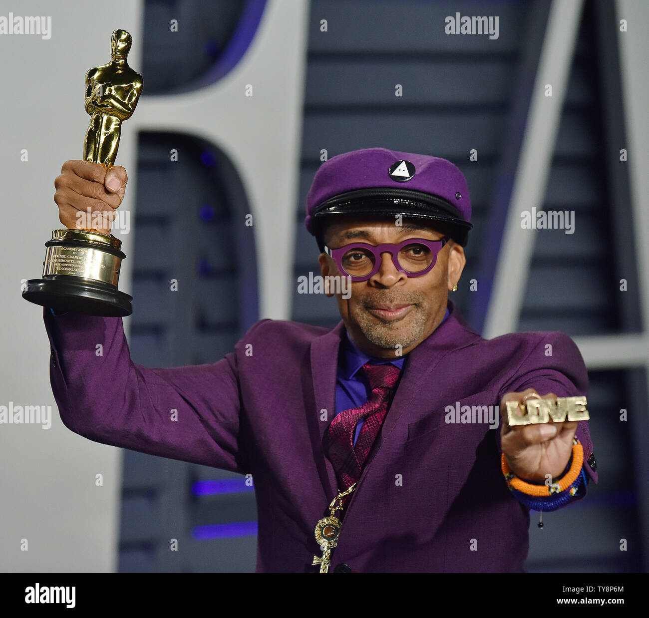 Director and writer Spike Lee holds up his Oscar for Best Adapted ...