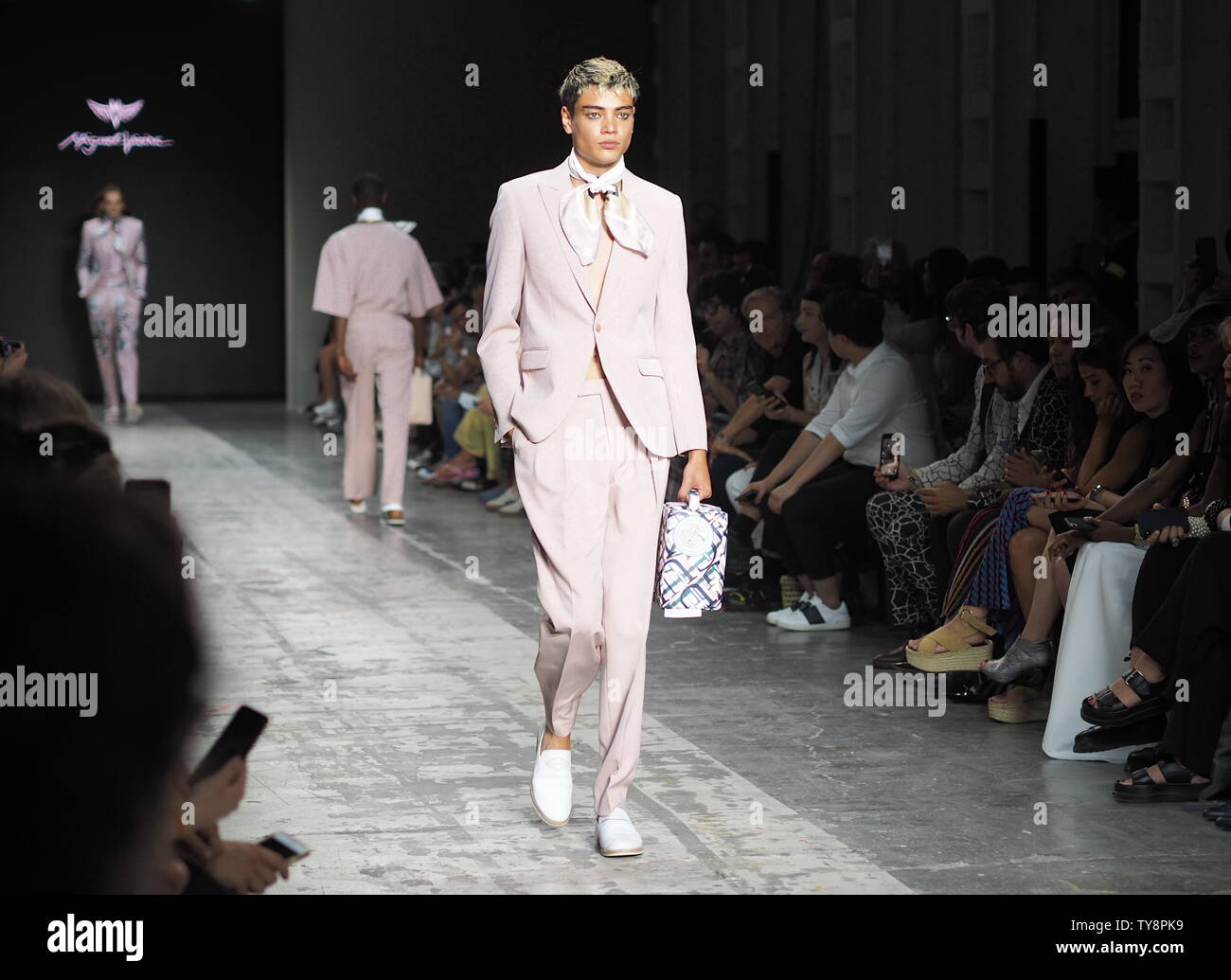 MILAN, ITALY - June 17: Models parade on catwalk for Miguel Vieira ...