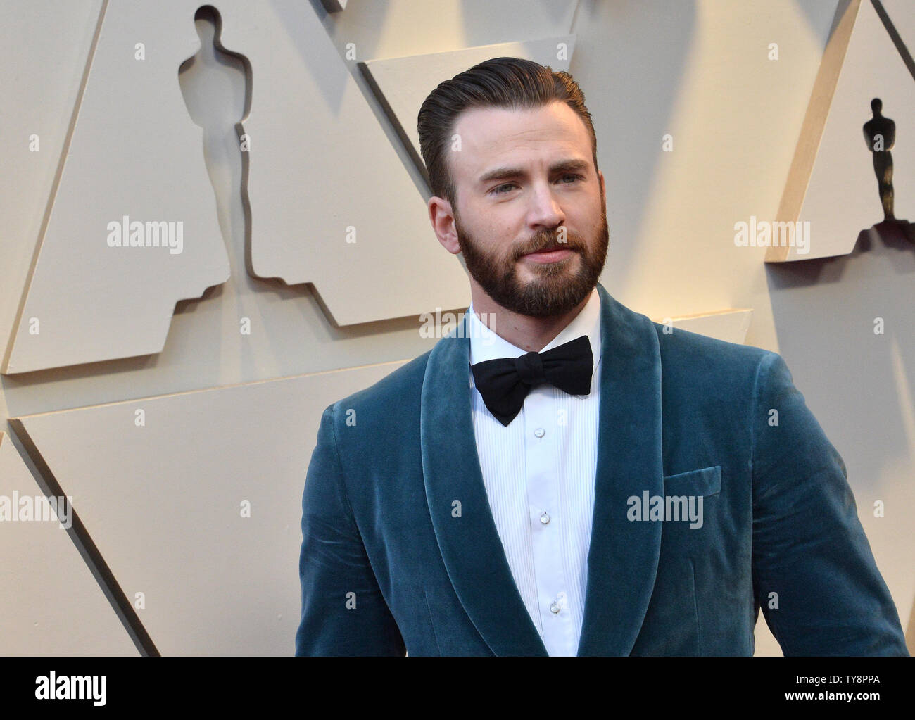 Chris Evans arrives on the red carpet for the 91st annual Academy ...