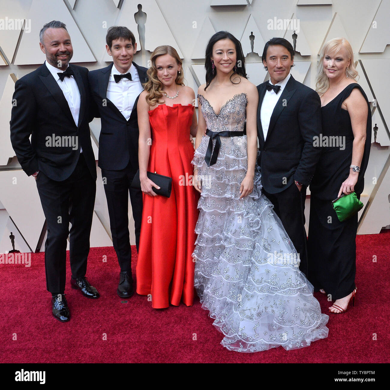 Alex Honnold (2nd L), Elizabeth Chai Vasarhelyi, Jimmy Chin (2nd R ...