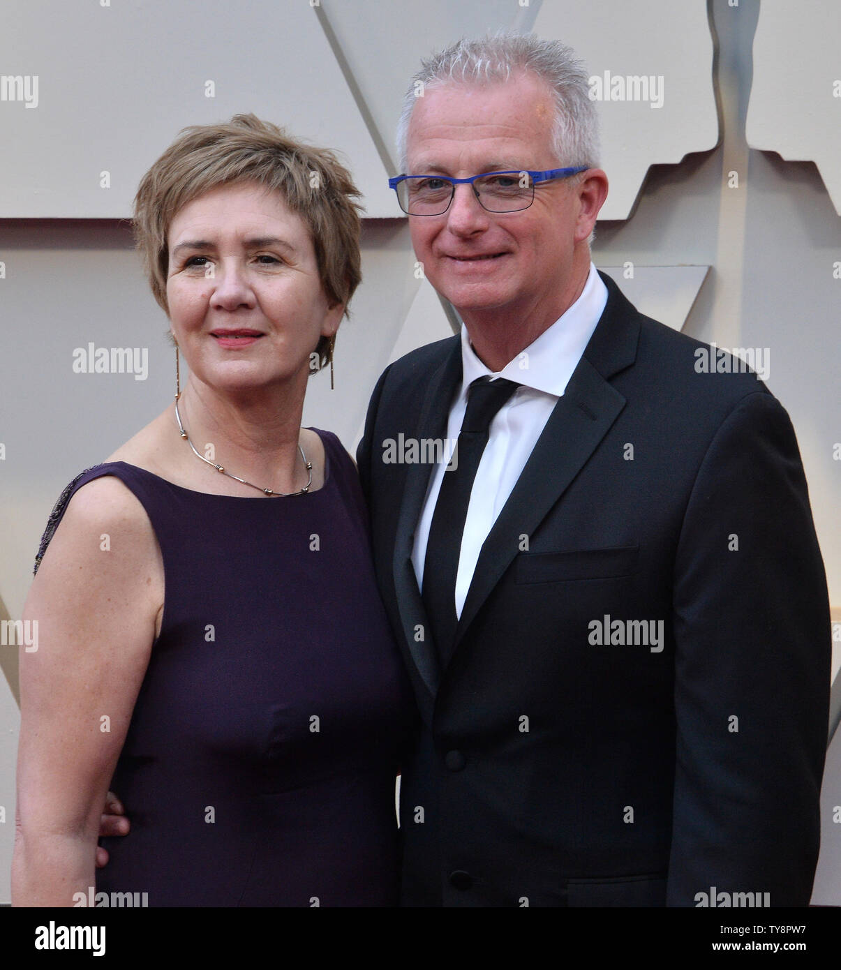 Peter Devlin (R) and guest arrive on the red carpet for the 91st annual ...