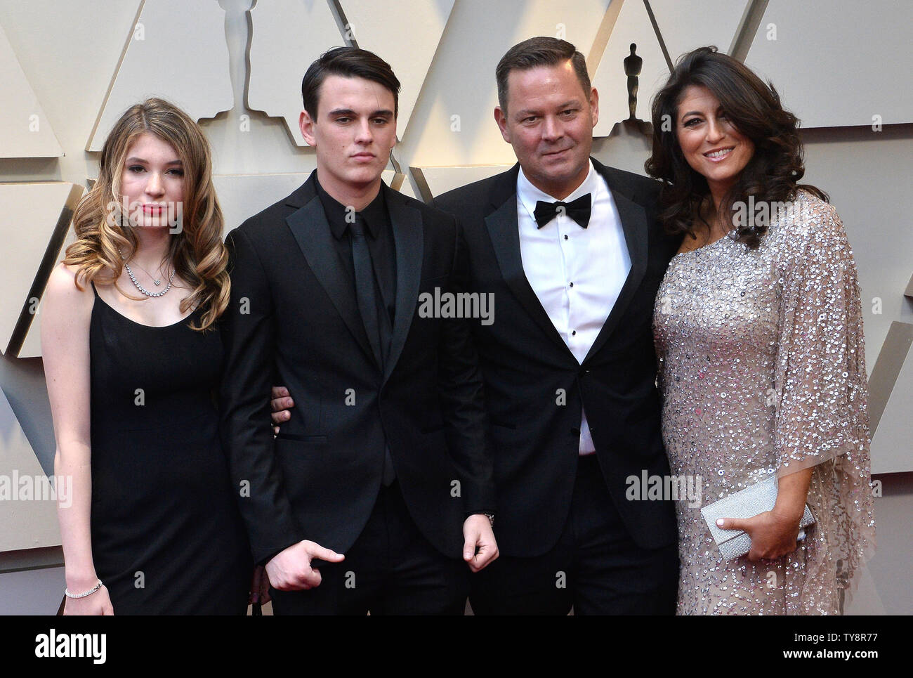Kevin Messick and family arrive on the red carpet for the 91st annual ...