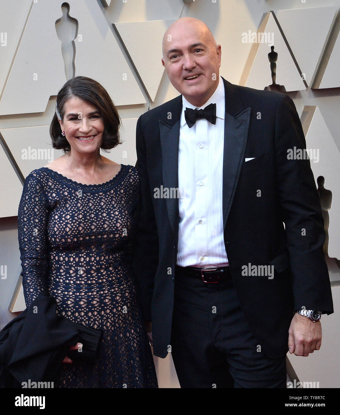 Roger Guyett and guest arrive on the red carpet for the 91st annual ...