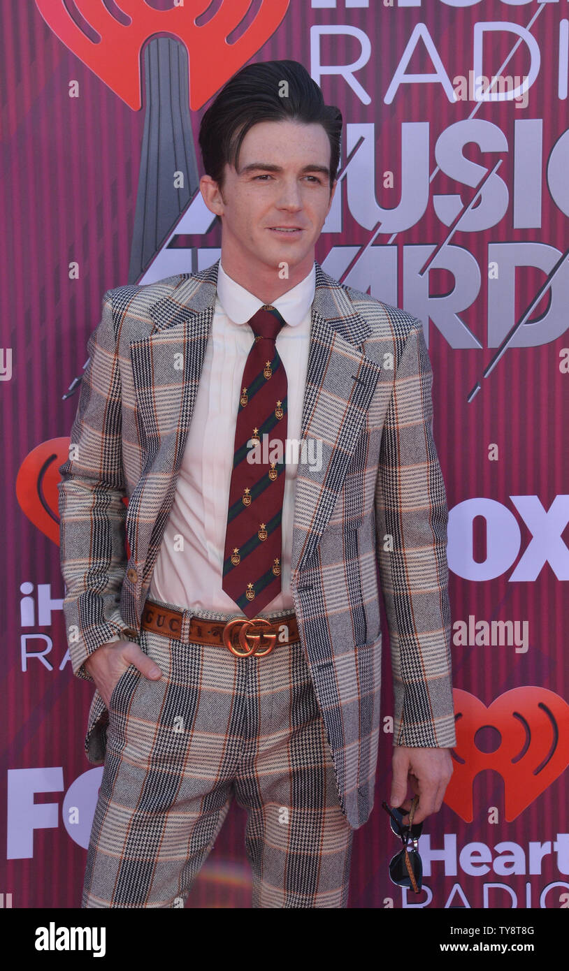 Drake Bell arrives for the sixth annual iHeartRadio Music Awards at the ...