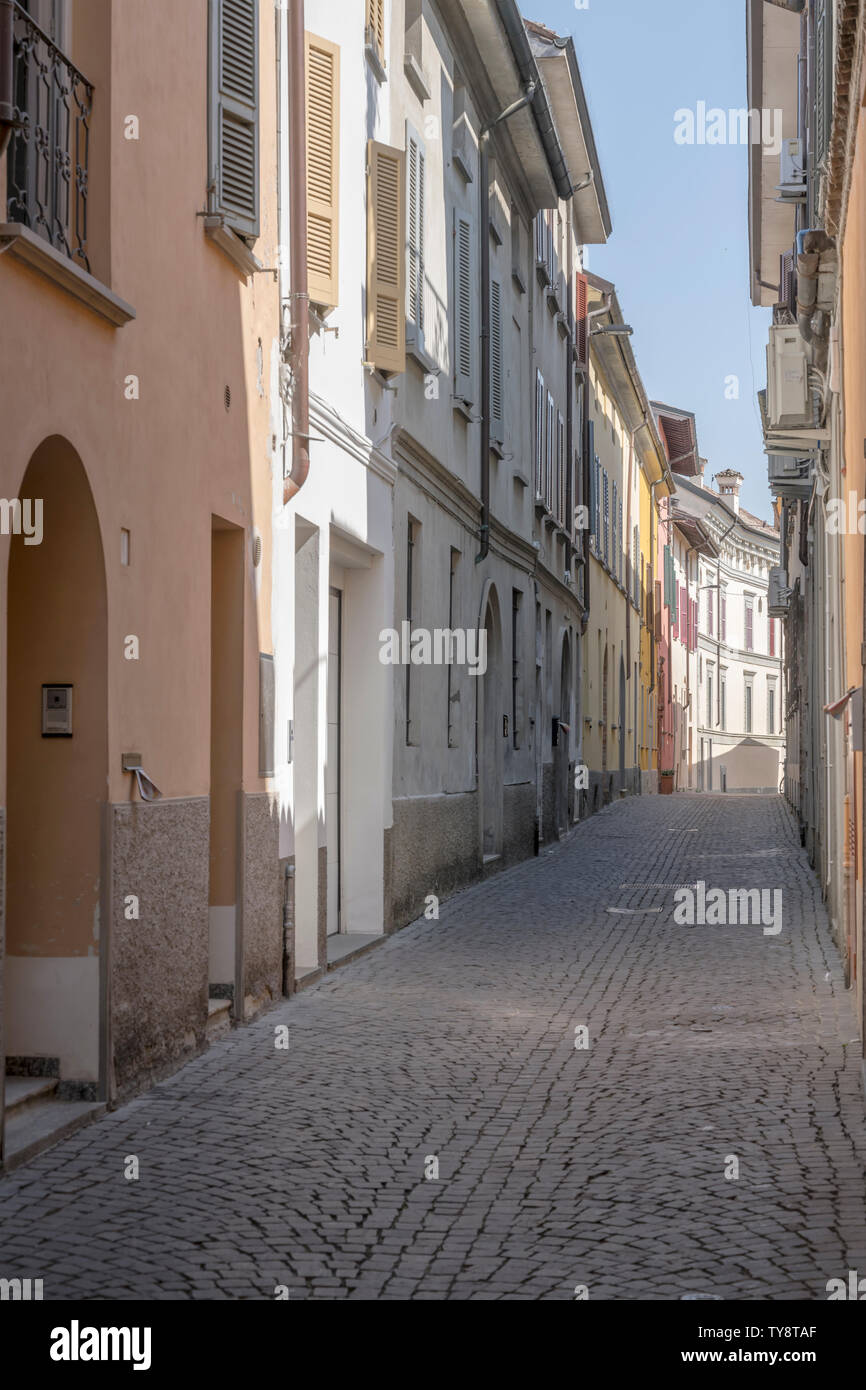 cityscape with old houses on narrow street, shot in bright summer light ...