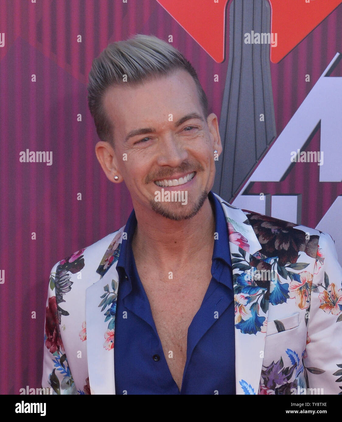 Damon Sharpe arrives for the sixth annual iHeartRadio Music Awards at ...