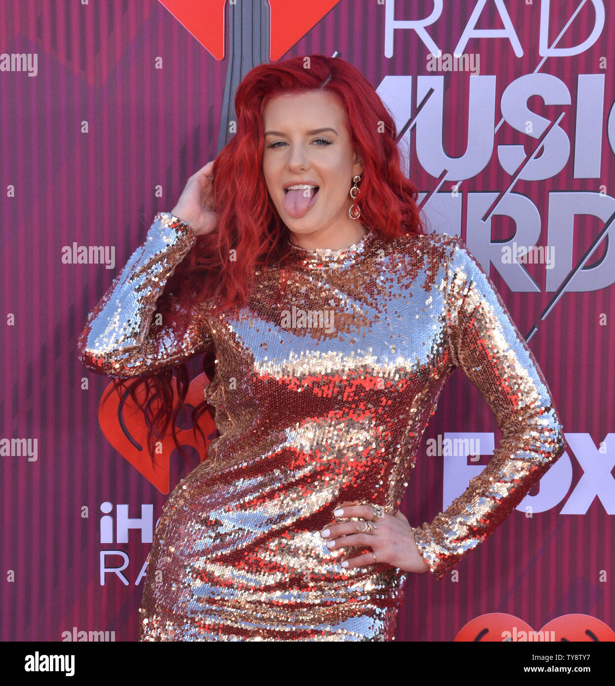 Justina Valentine arrives for the sixth annual iHeartRadio Music Awards ...