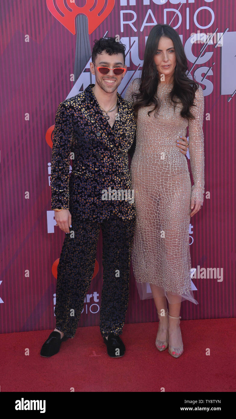 MAX (L) and and Emily Cannon arrive for the sixth annual iHeartRadio ...