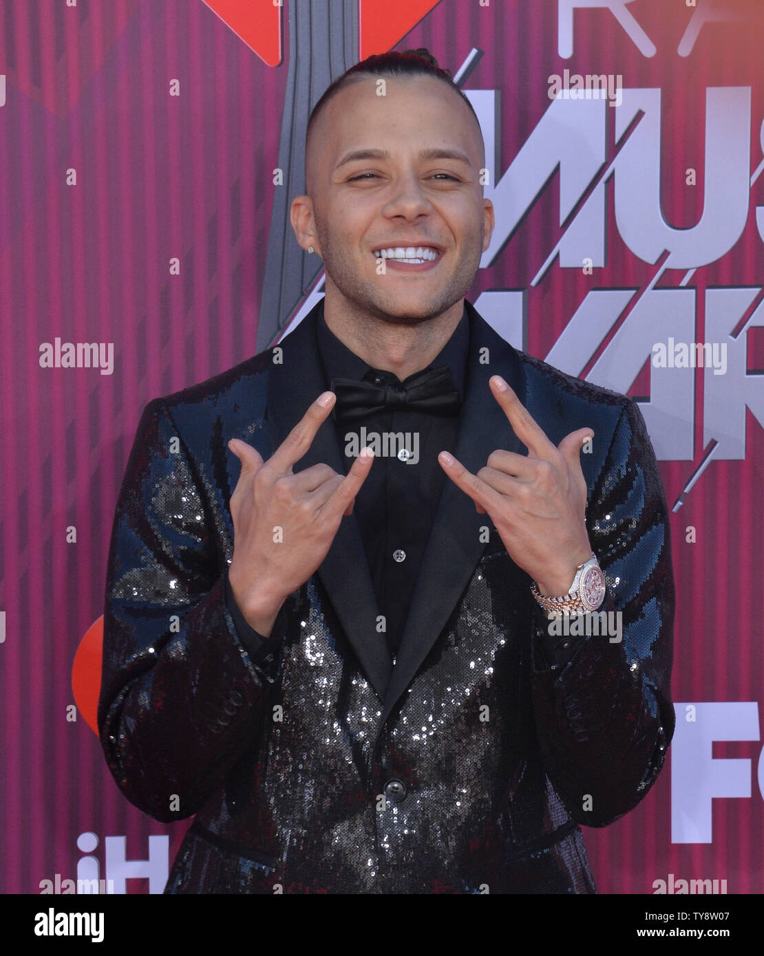Nio Garcia arrives for the sixth annual iHeartRadio Music Awards at the ...