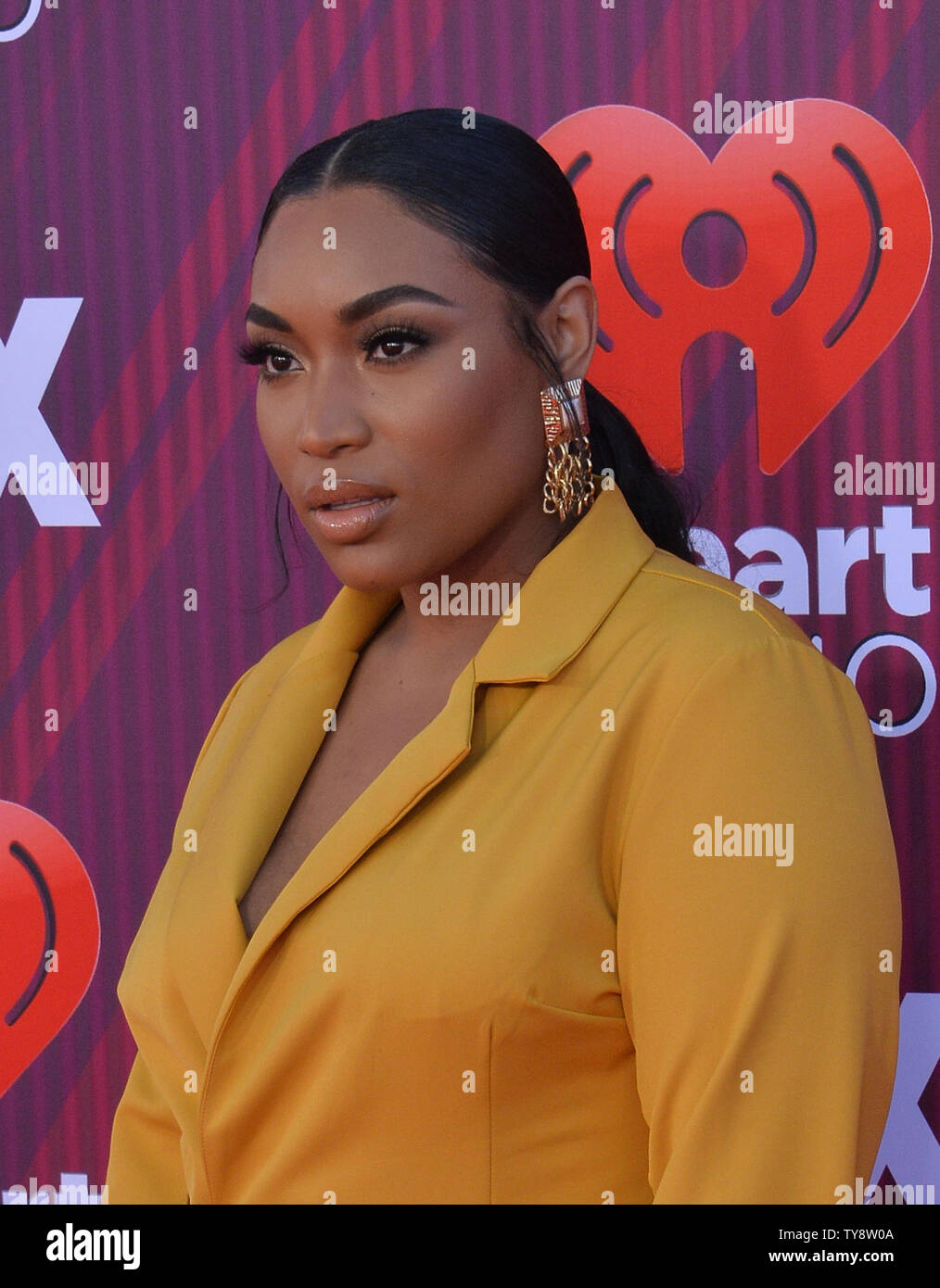 Iris arrives for the sixth annual iHeartRadio Music Awards at the ...