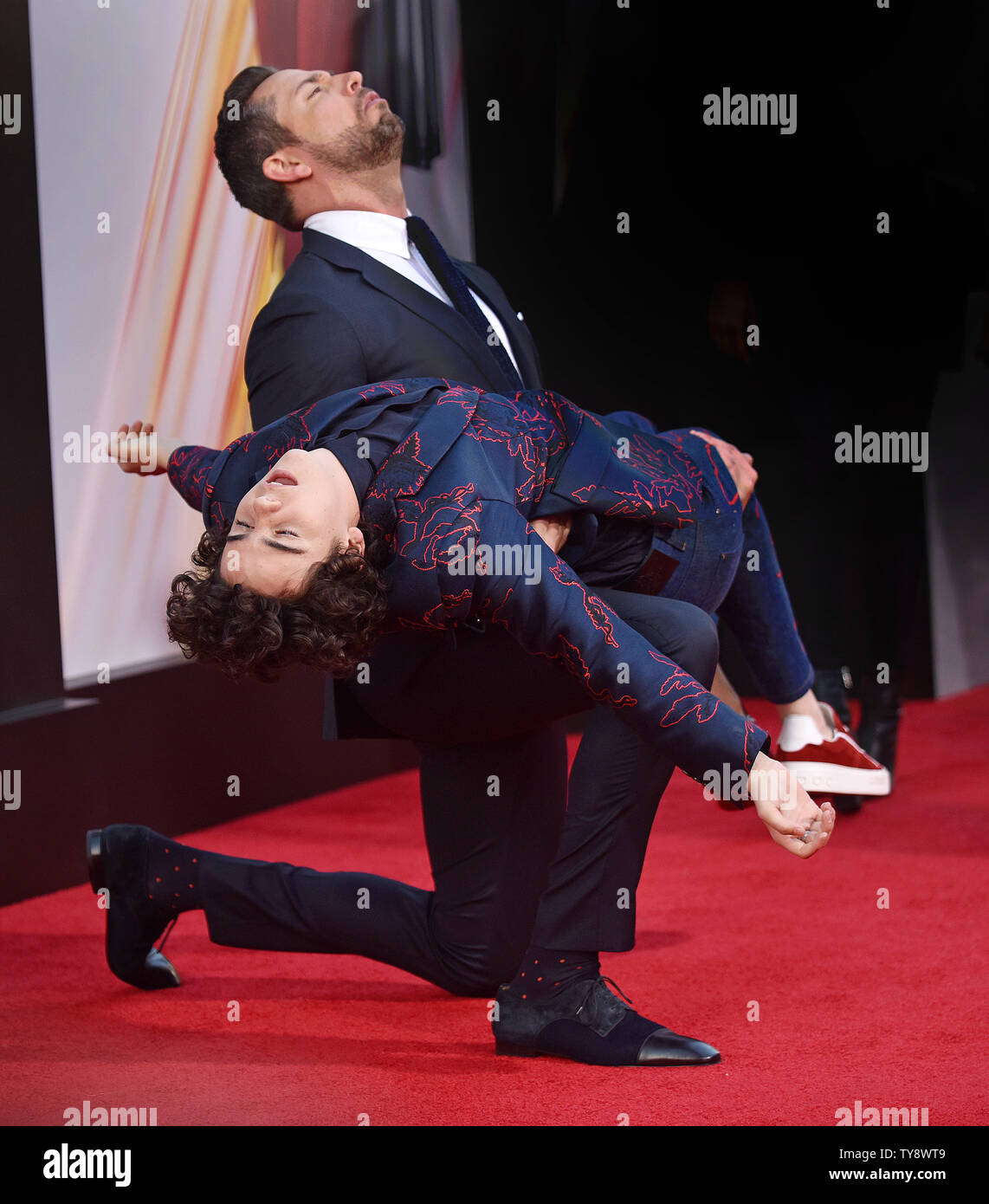 Zachary Levi (R) lifts castmate Jack Dylan Grazer as they arrive on the ...