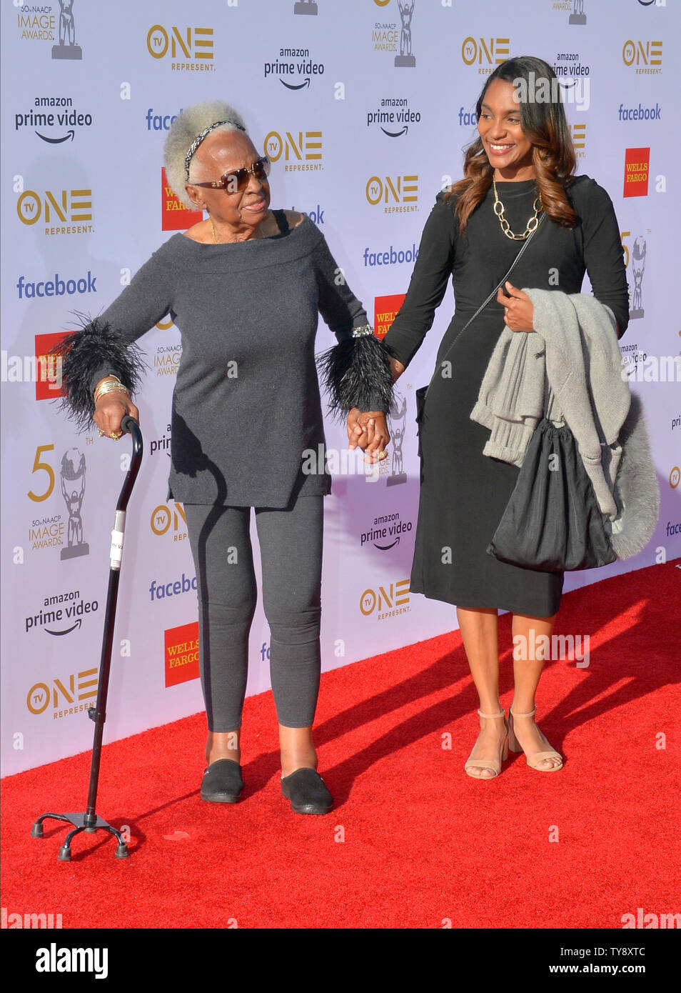 Toni Vaz (L) arrives for the 50th annual NAACP Image Awards at the ...