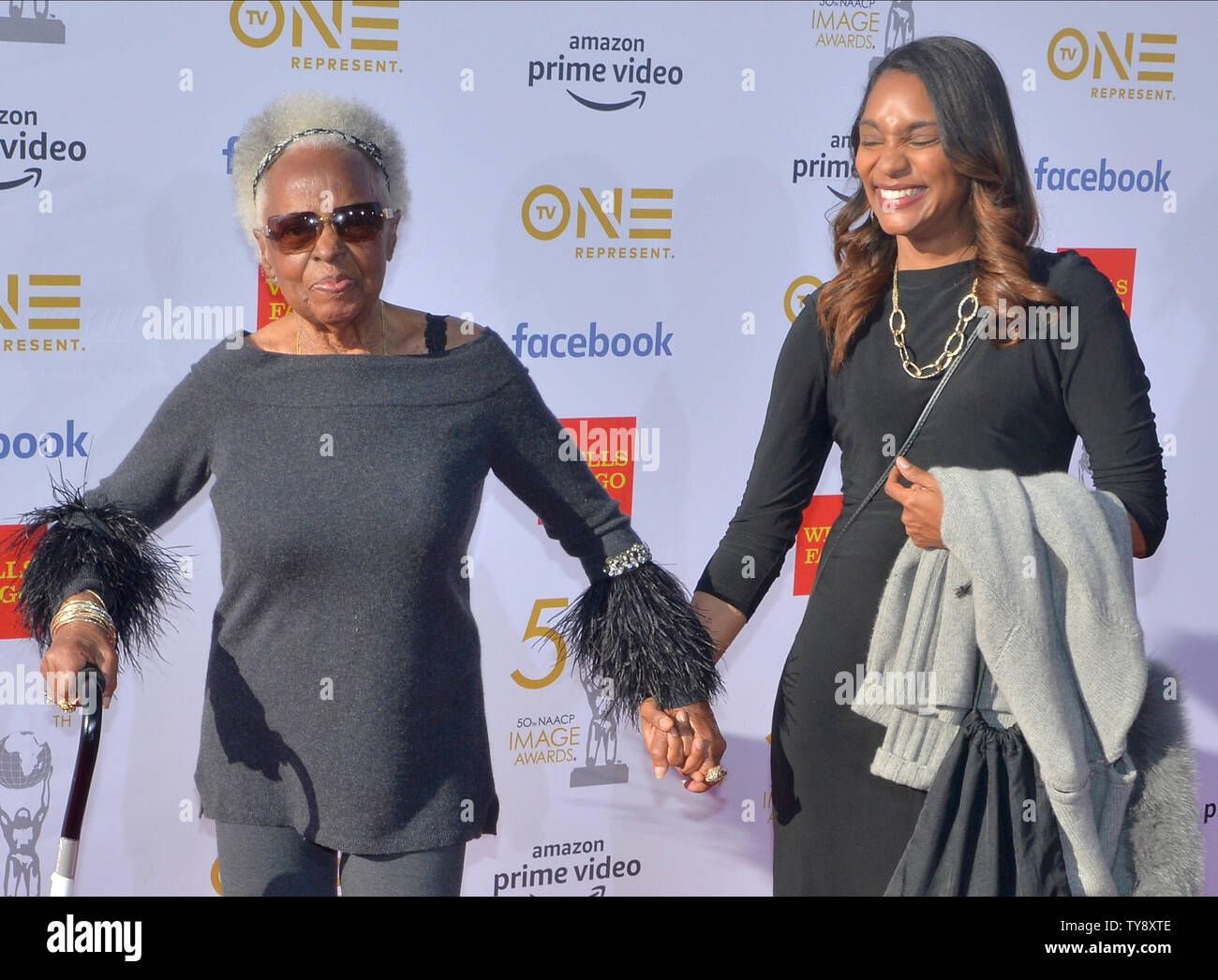 Toni Vaz (L) arrives for the 50th annual NAACP Image Awards at the ...