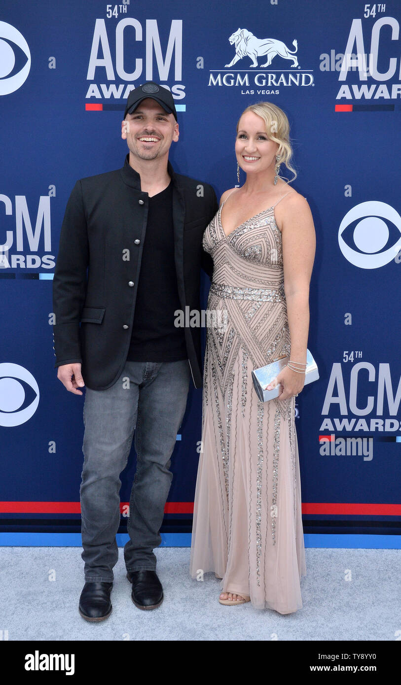 Jon Nite (L) and guest attend the 54th annual Academy of Country Music ...
