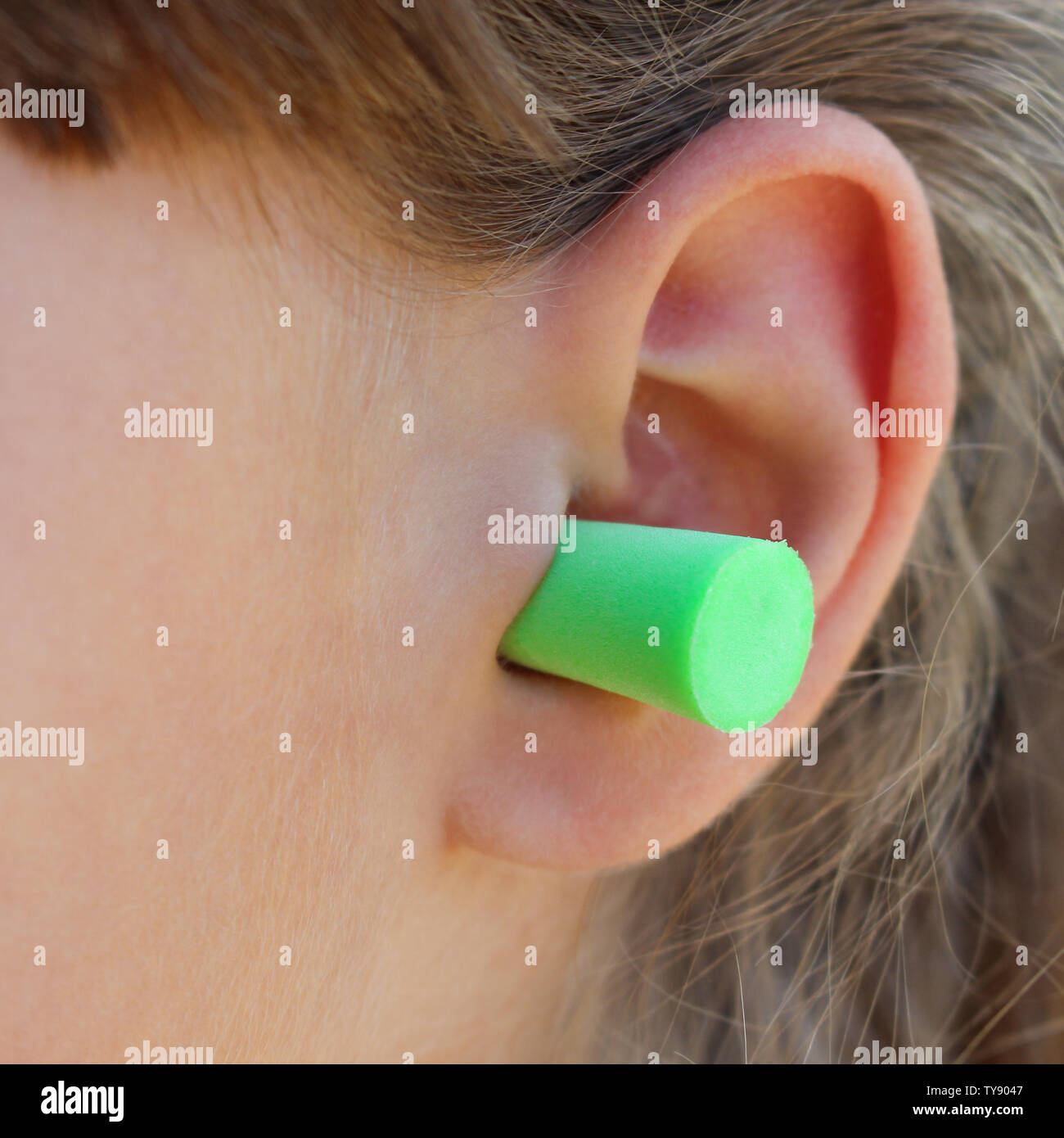 Ear plugs to protect against the noise Stock Photo - Alamy