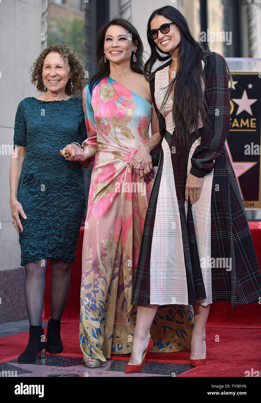 (L-R) Rhea Perlman, Lucy Liu and Demi Moore attend the star unveiling ...