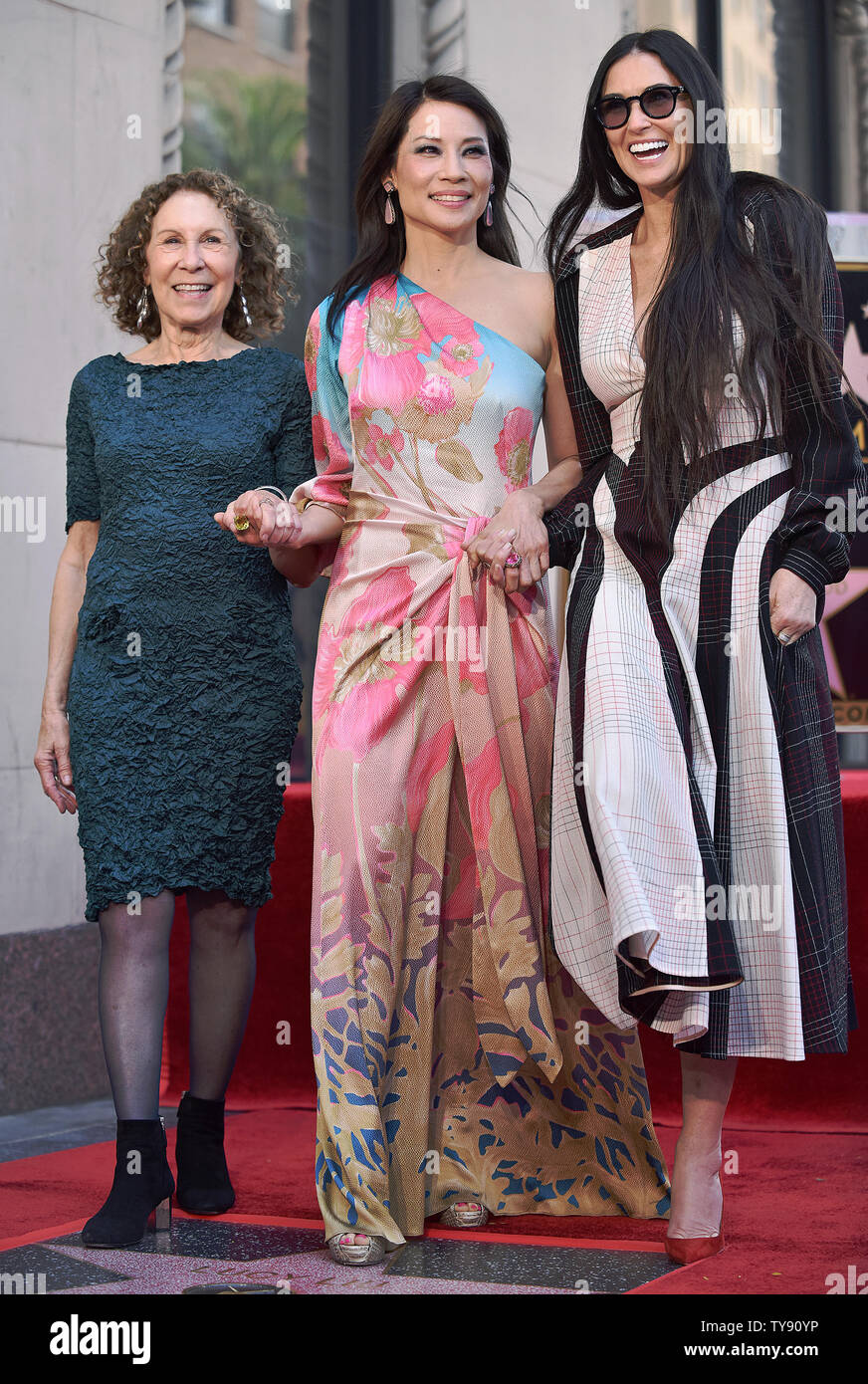 (L-R) Rhea Perlman, Lucy Liu and Demi Moore attend the star unveiling ...