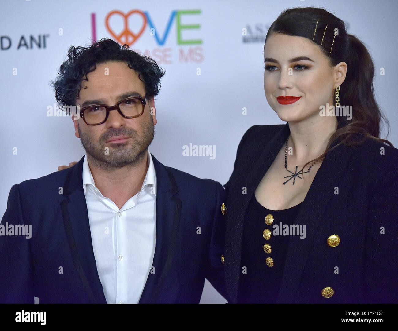 Johnny Galecki (L) and his girlfriend Alaina Meyer arrive on the orange ...