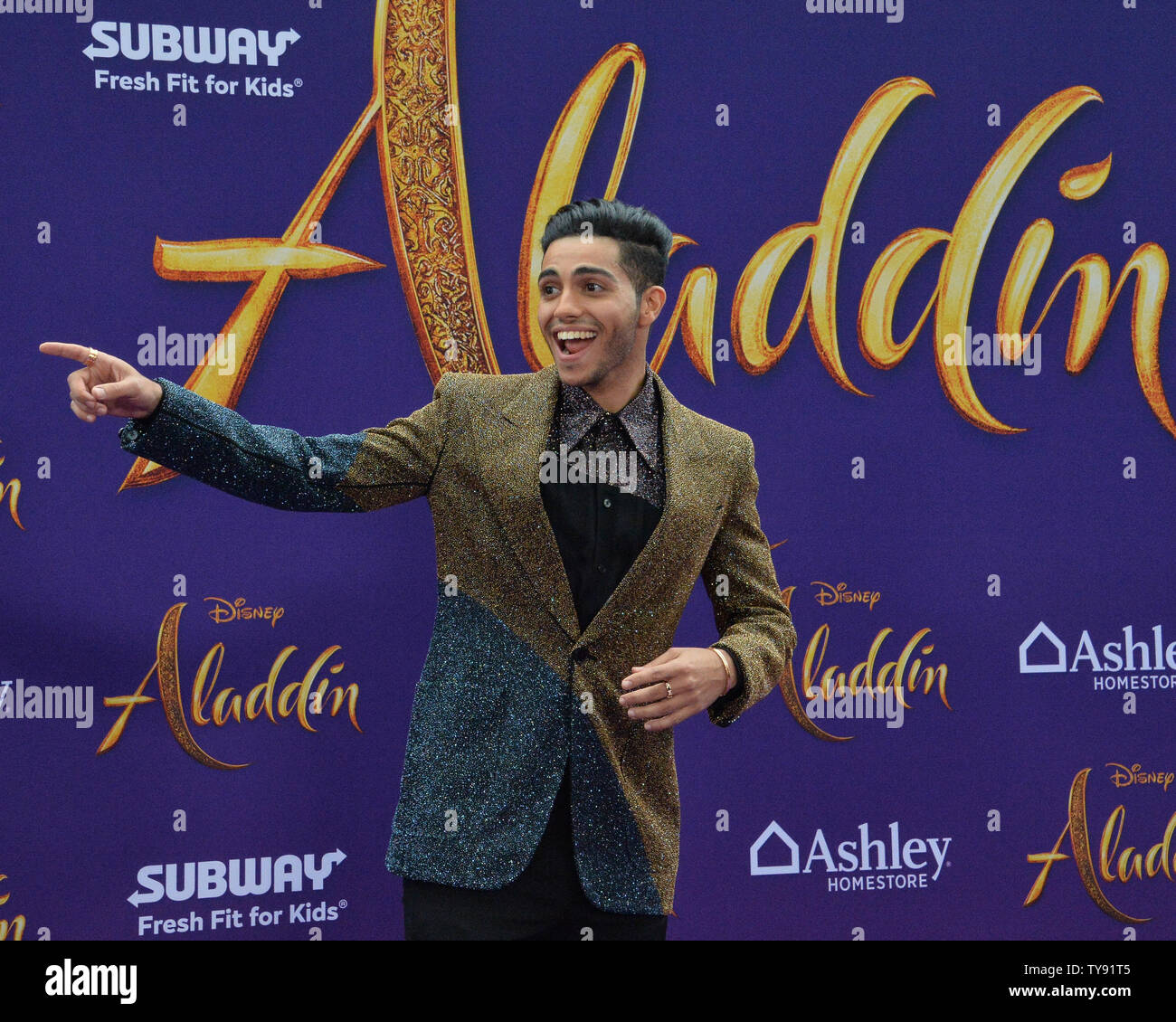 Cast member Mena Massoud attends the premiere of the motion picture ...