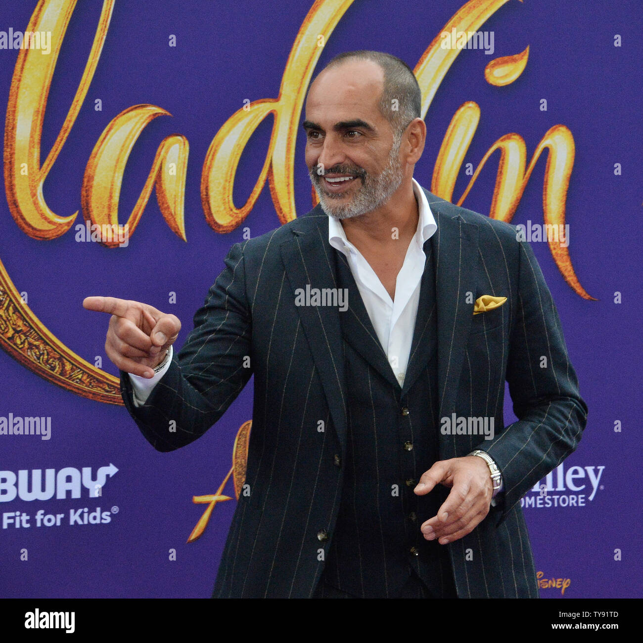 Cast member Navid Negahban attends the premiere of the motion picture ...