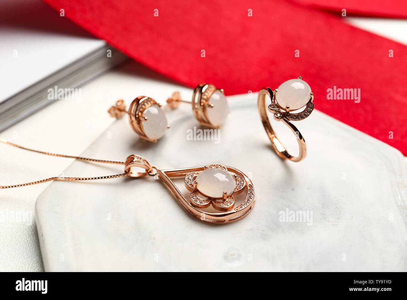 Jade glass species jade earrings hi-res stock photography and images ...