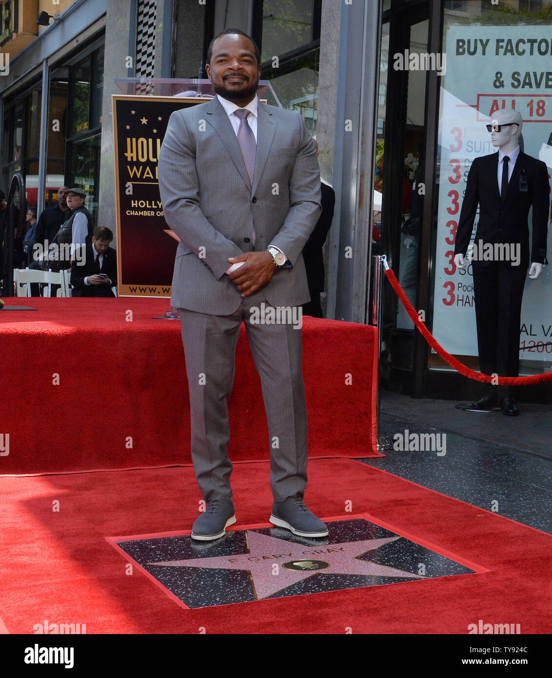 Director F. Gary Gray stands atop his star during an unveiling ceremony ...