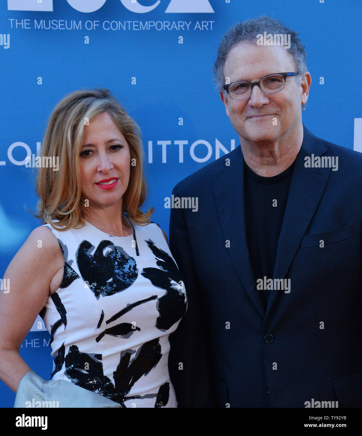 Actor Albert Brooks (R) and his wife, artist Kimberly Shlain attend the ...