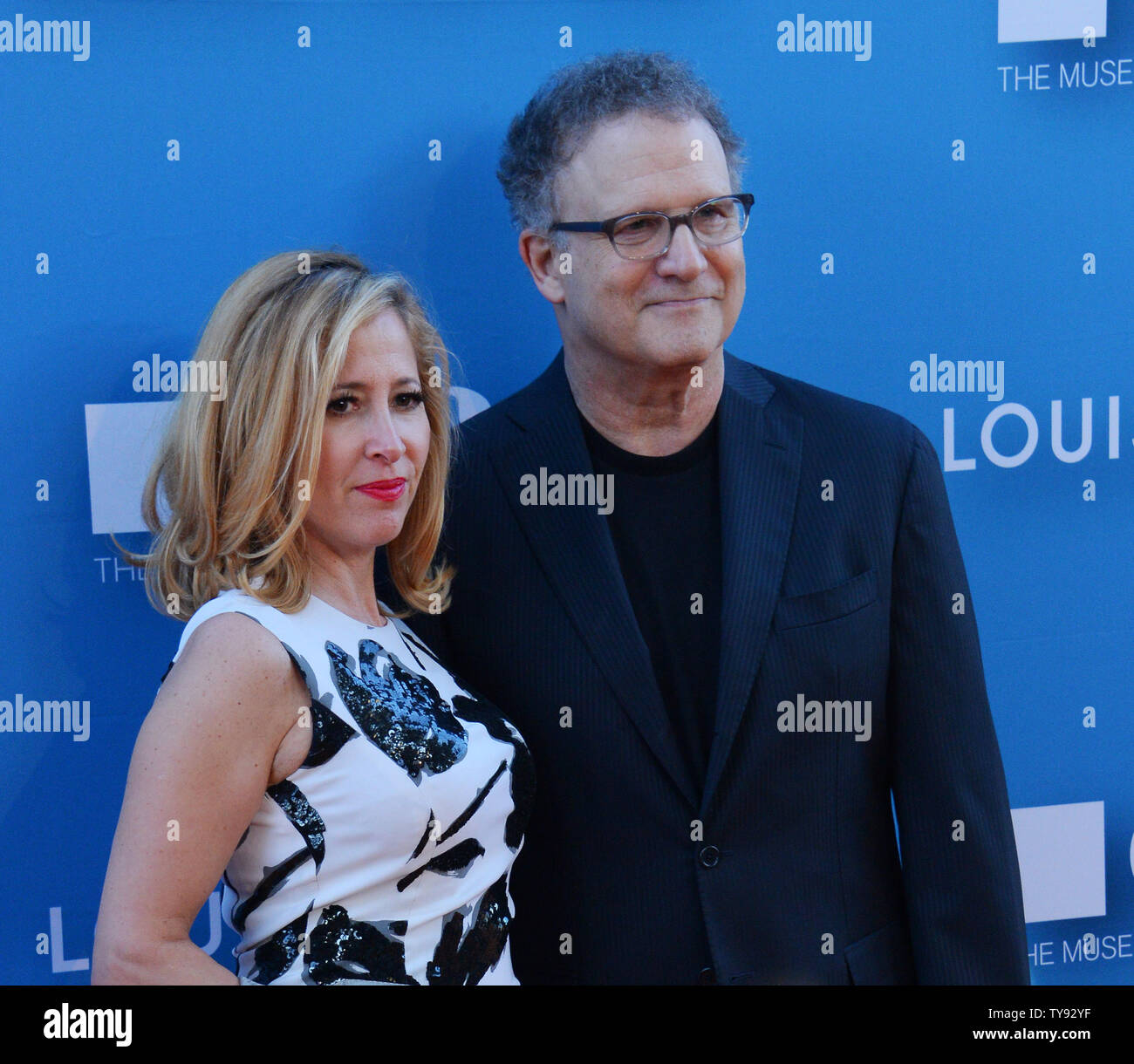 Actor Albert Brooks (R) and his wife, artist Kimberly Shlain attend the ...