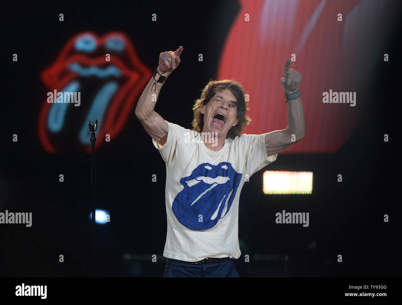 Musician Mick Jagger of The Rolling Stones performs onstage during ...
