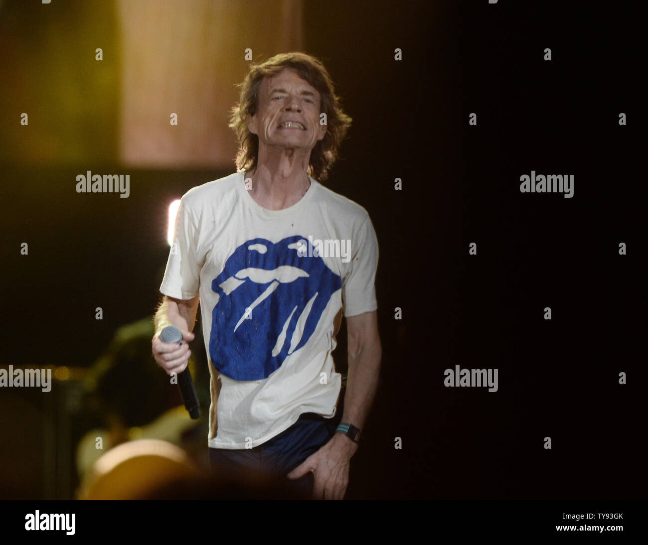 Musician Mick Jagger of The Rolling Stones performs onstage during ...