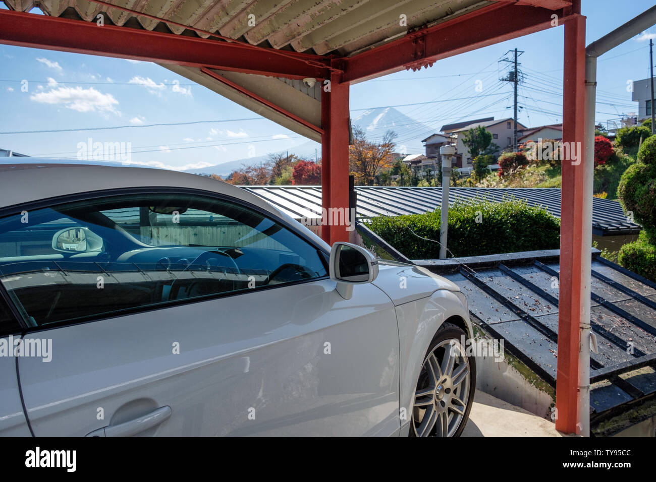 Car parked in open garage hi-res stock photography and images - Alamy