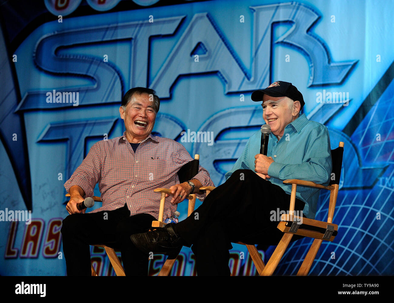 Actors George Takei (L) and Walter Koenig participate in the Official ...