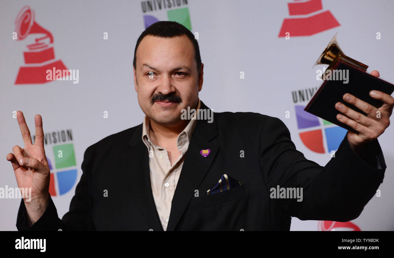 Singer Pepe Aguilar appears backstage with his award for Best Ranchero ...