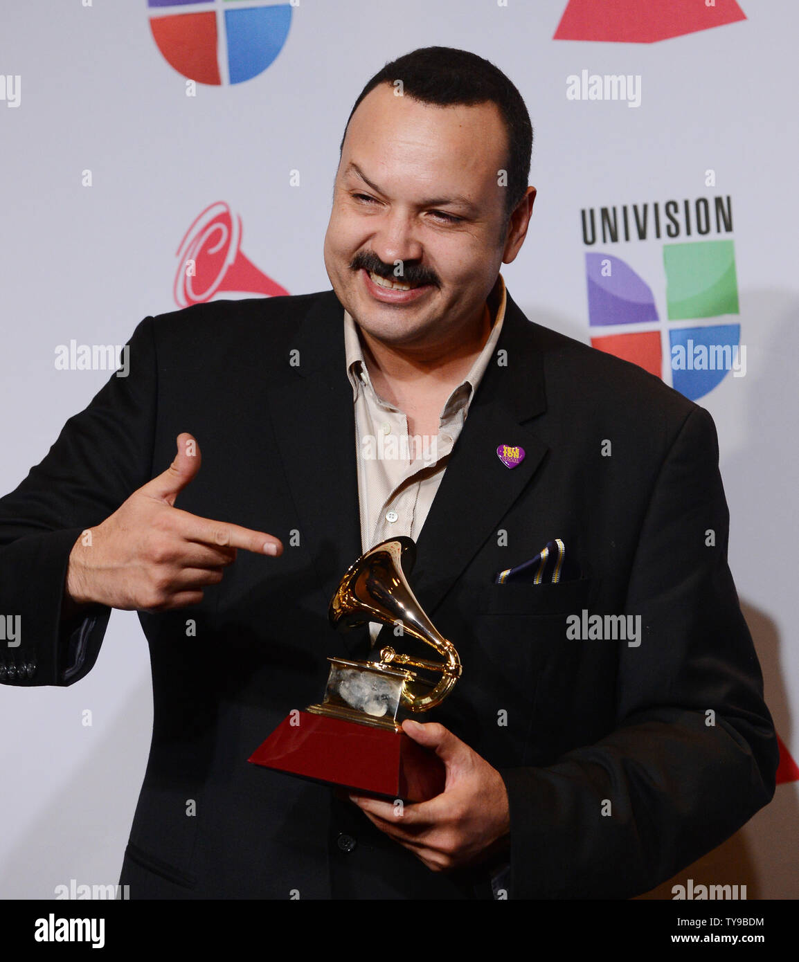 Singer Pepe Aguilar appears backstage with his award for Best Ranchero ...