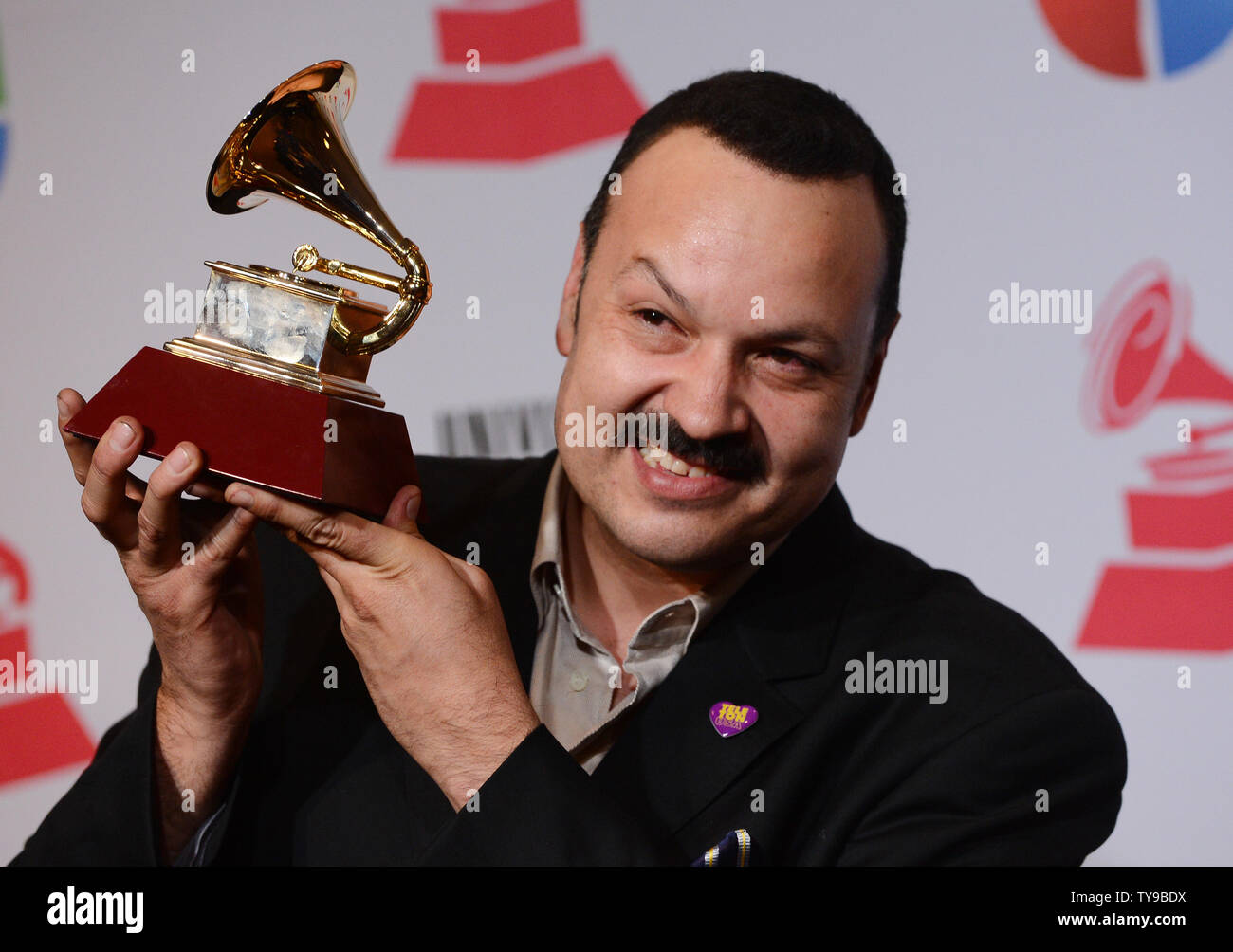 Singer Pepe Aguilar appears backstage with his award for Best Ranchero ...