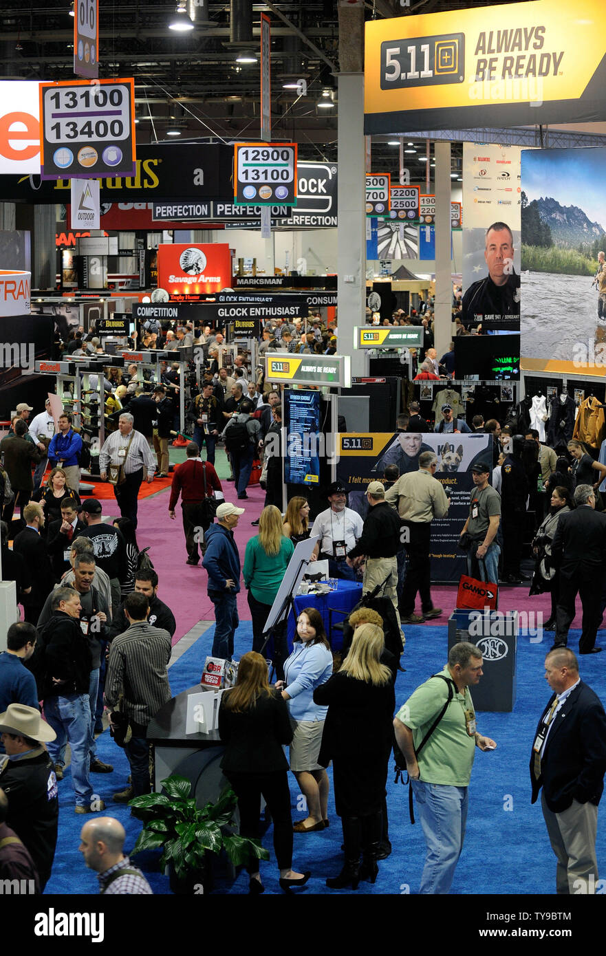 Visitors attend the National Shooting Sports Foundation's 35th annual ...