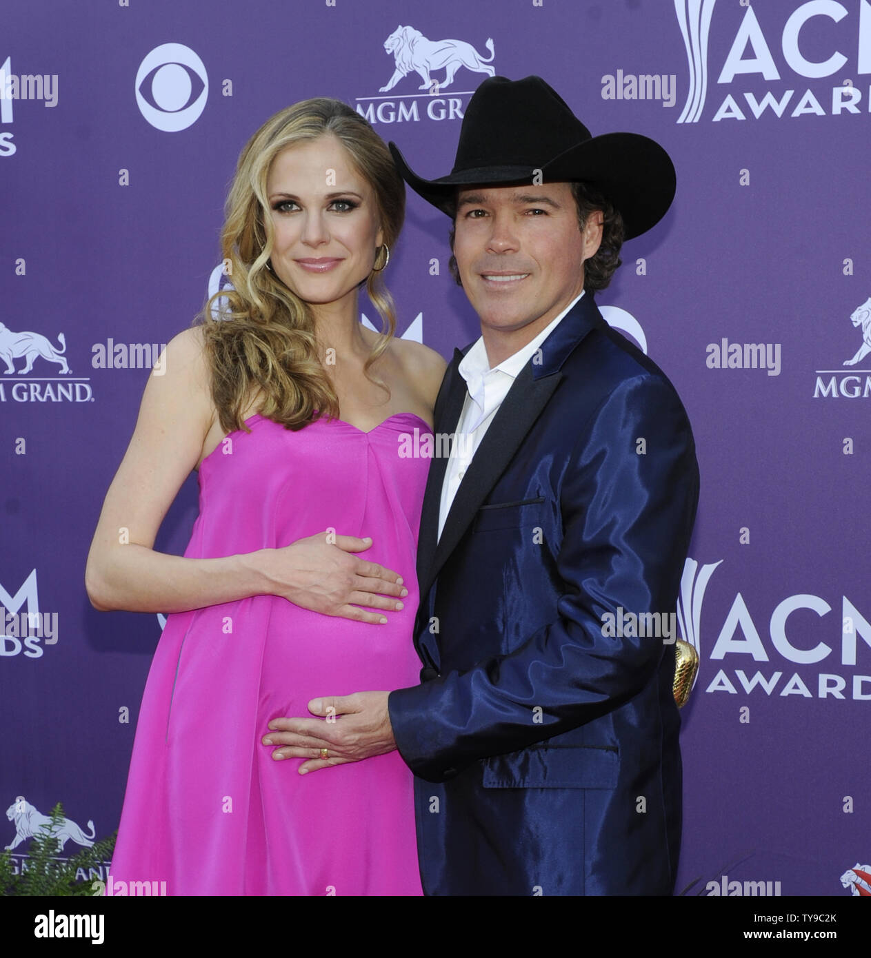 Singer Clay Walker (R) and model Jessica Craig arrive at the 48th ...