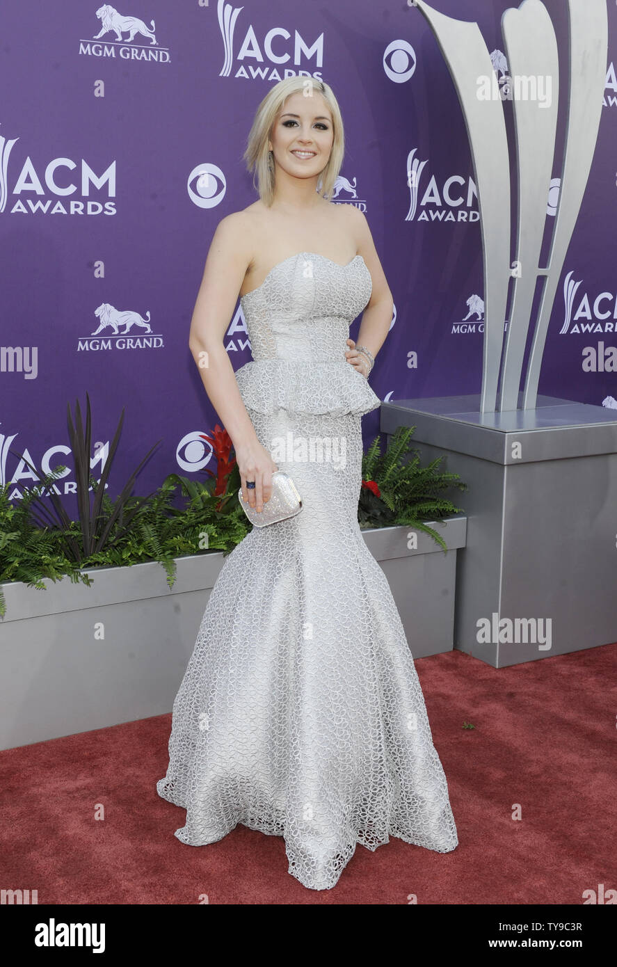 Singer Maggie Rose arrives at the 48th annual Academy of Country Music ...