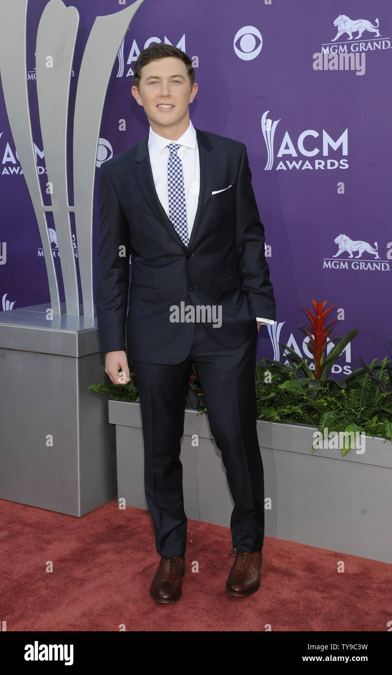 Singer Scotty McCreery arrives at the 48th annual Academy of Country ...