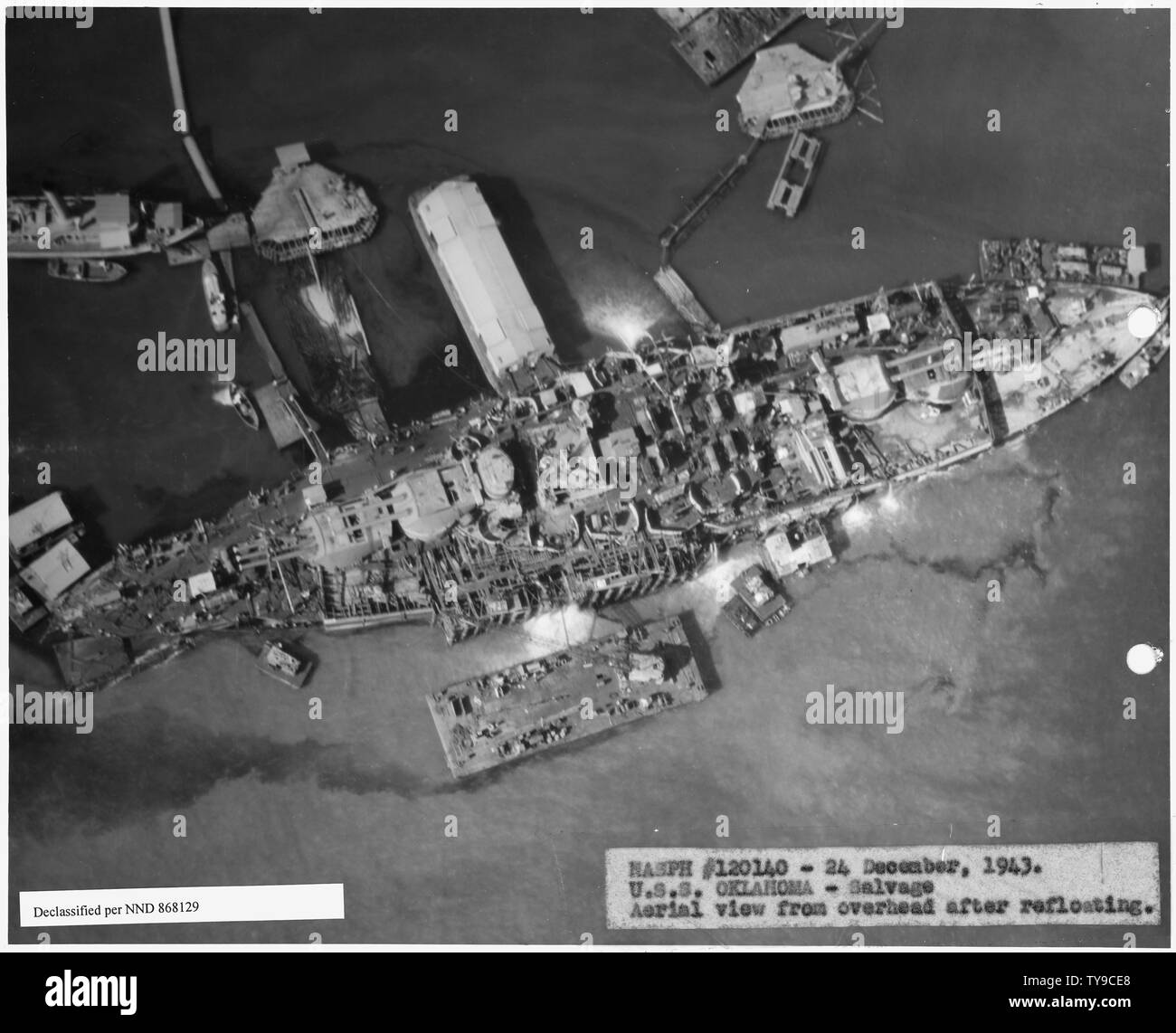 NASPH #120140- 24 Dec 1943. USS Oklahoma - Salvage; Aerial view from ...