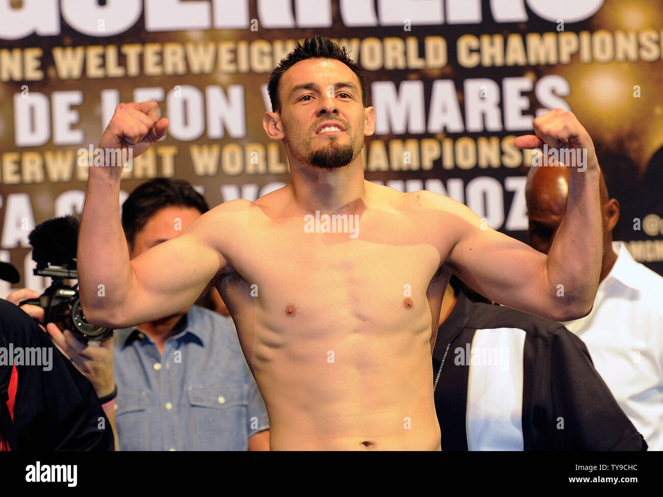 Boxer Robert Guerrero weighs in at 147 pounds for his fight against ...