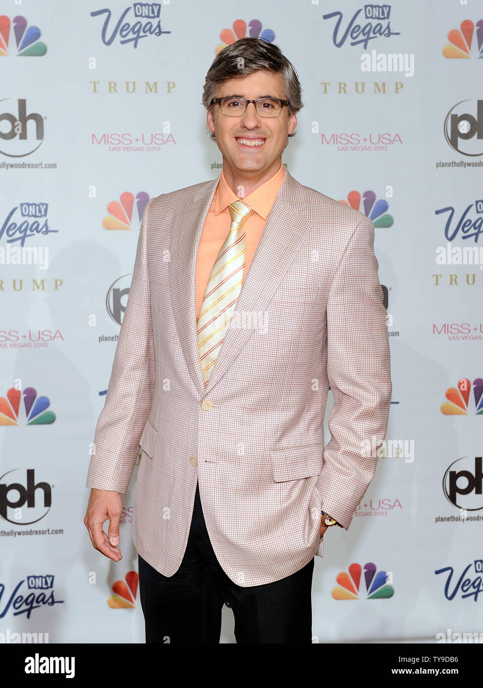 Writer, comedian and pageant judge Mo Rocca arrives at the 2013 Miss ...