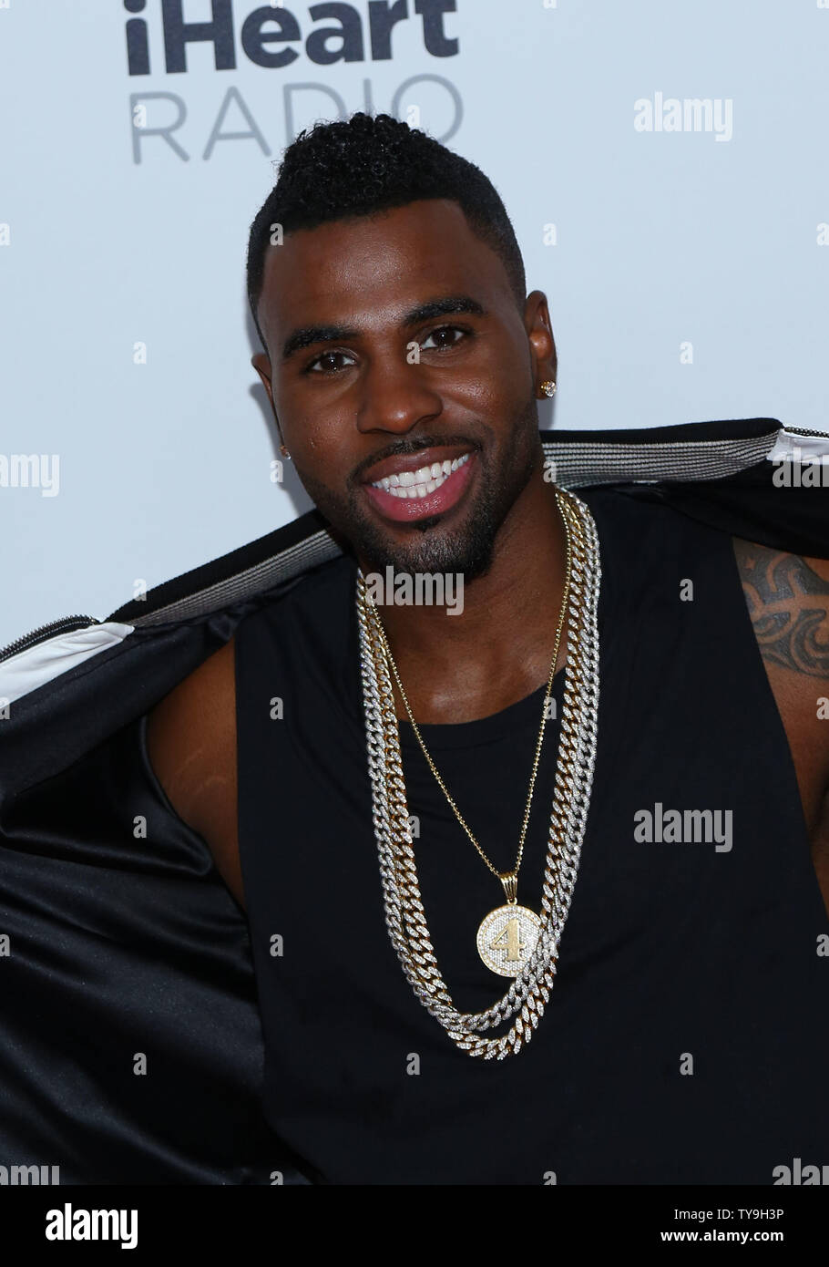 Jason Derulo arrives in the press room for the iHeartRadio Music ...