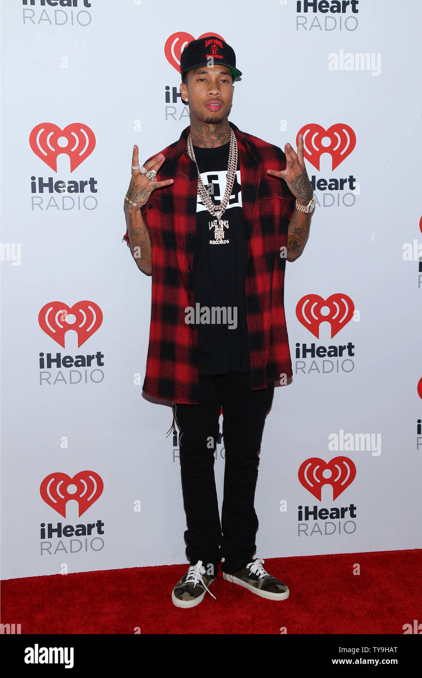 Rapper Tyga arrives for the iHeartRadio Music Festival at the MGM Grand ...