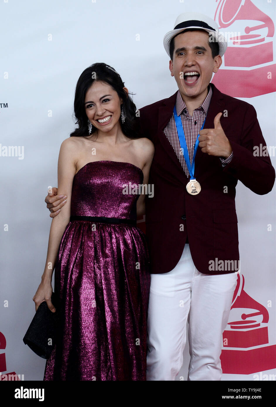 Andres Salguero aka 123 Andres (R) and guest arrive for the Latin ...