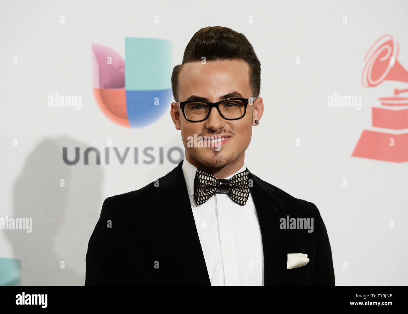 Johnny Sky poses backstage during the 16th Annual Latin Grammy Awards ...