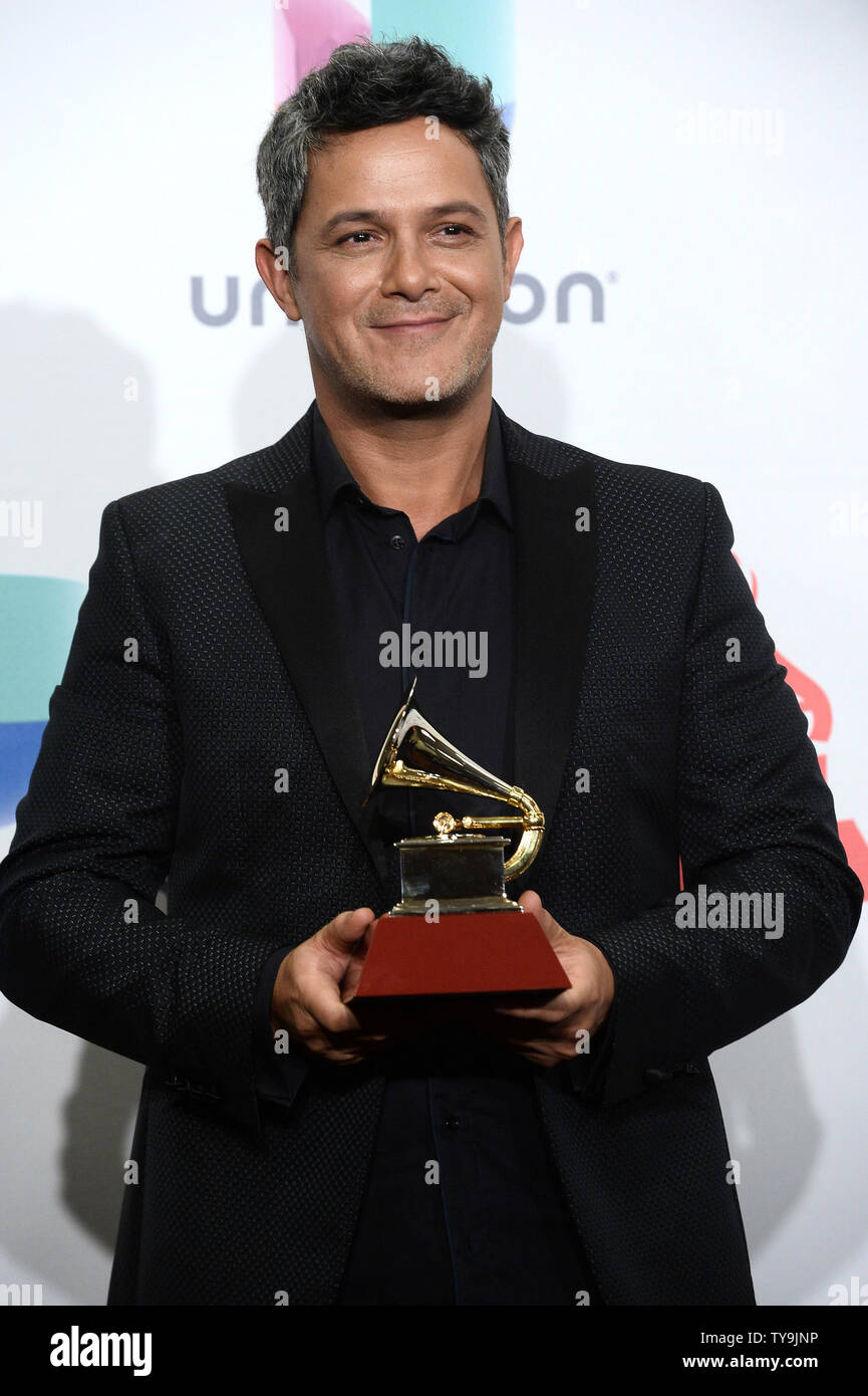 Alejandro Sanz poses in the pressroom with the award for best ...
